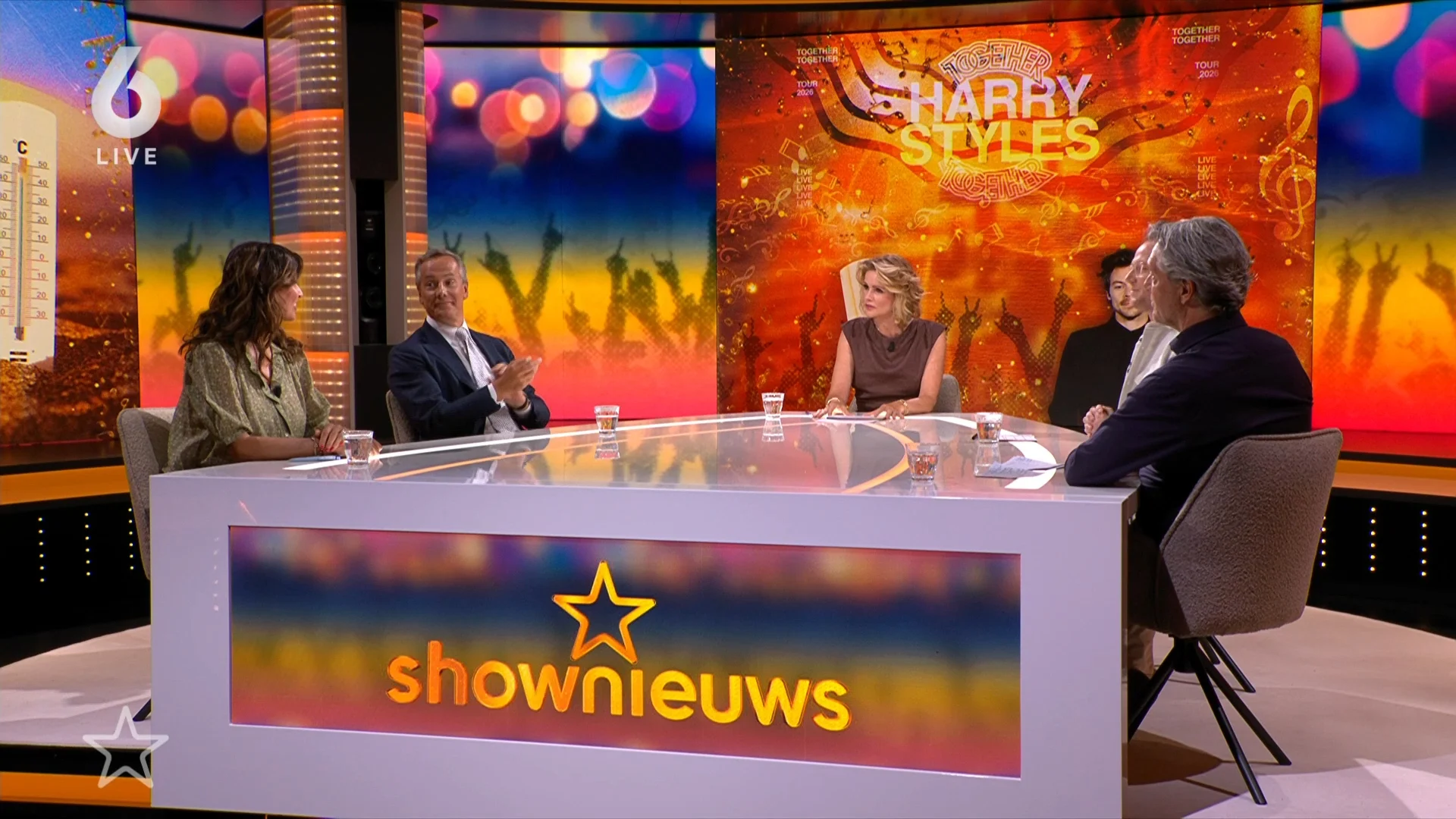 Harry Styles legt show stil om fan te helpen | Shownieuws