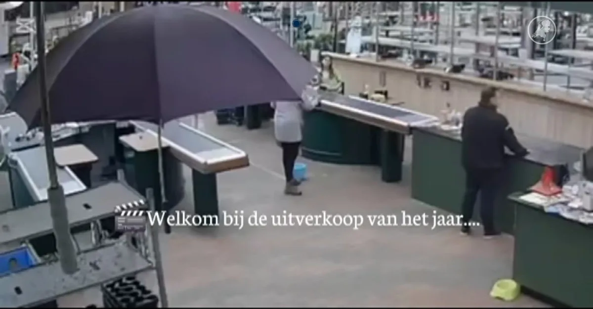 Vrouw plast emmer vol in tuincentrum en gooit 'm leeg