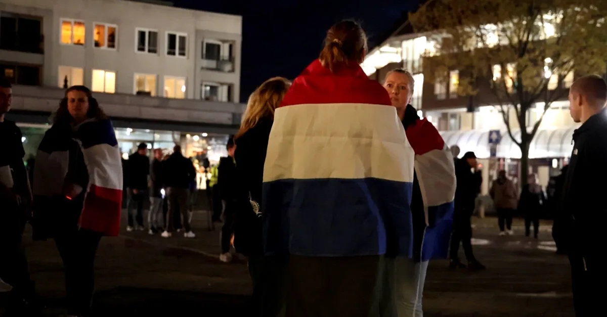 Voor- en tegenstanders lijnrecht tegenover elkaar bij azc-protest in ...